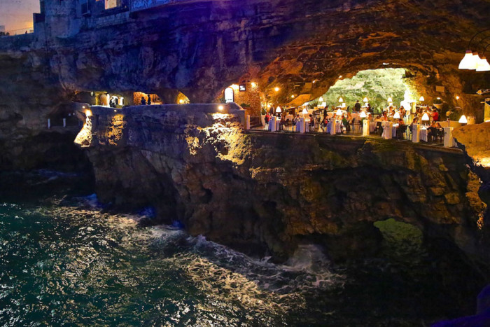 Magnificent Restaurant Built Into A Cave In A Cliff On The Italian ...