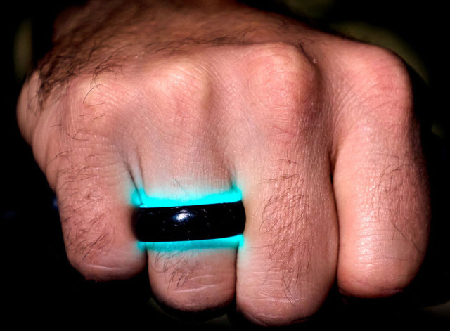Wedding Rings Made Of Carbon Fiber And Charged By UV Light | DeMilked