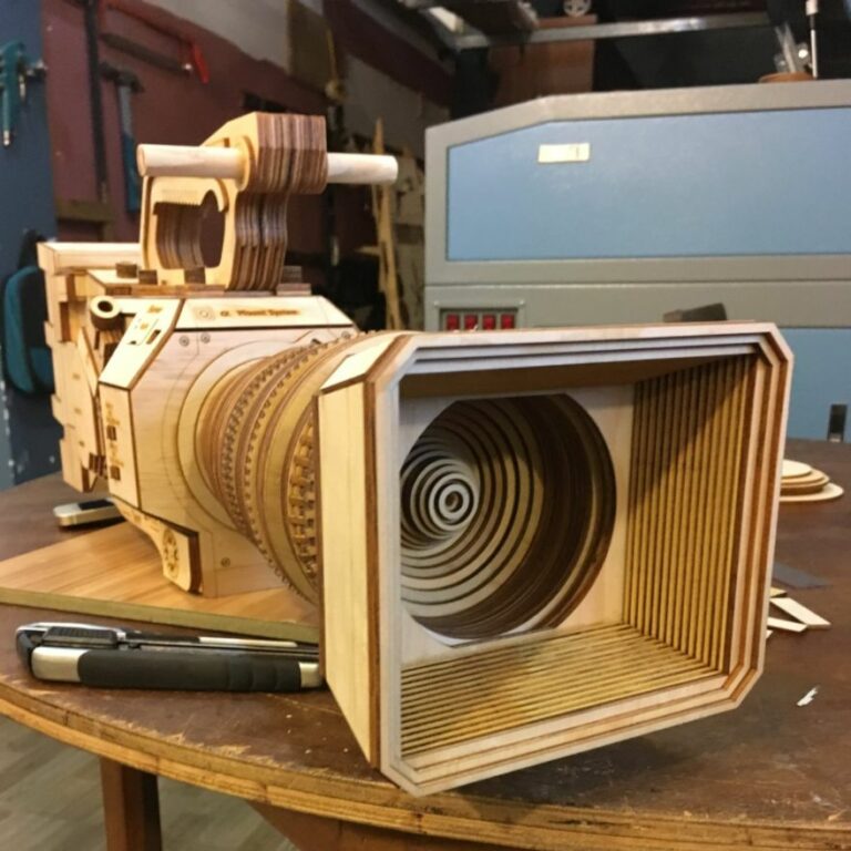 20 Times This Artist Recreated Popular Camera Models By Carving Wood In ...