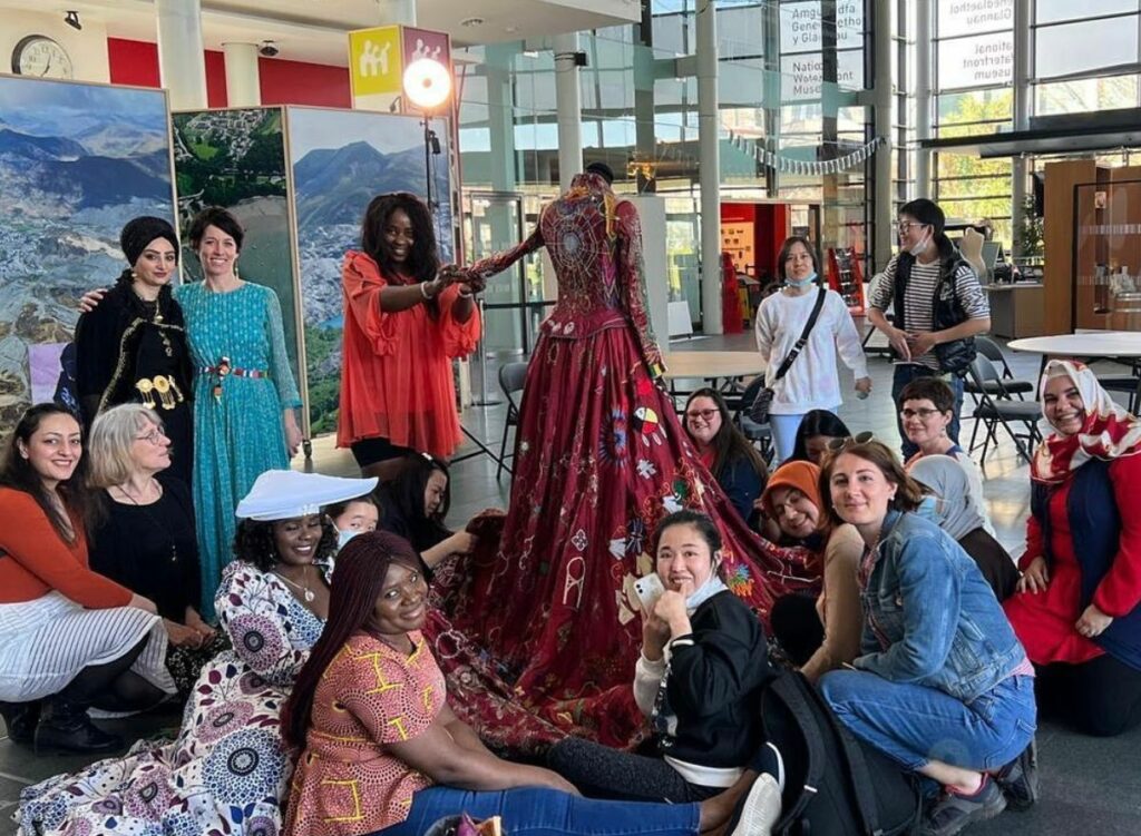 343 Embroiderers In 46 Countries Joined Hands To Make This "Red Dress ...