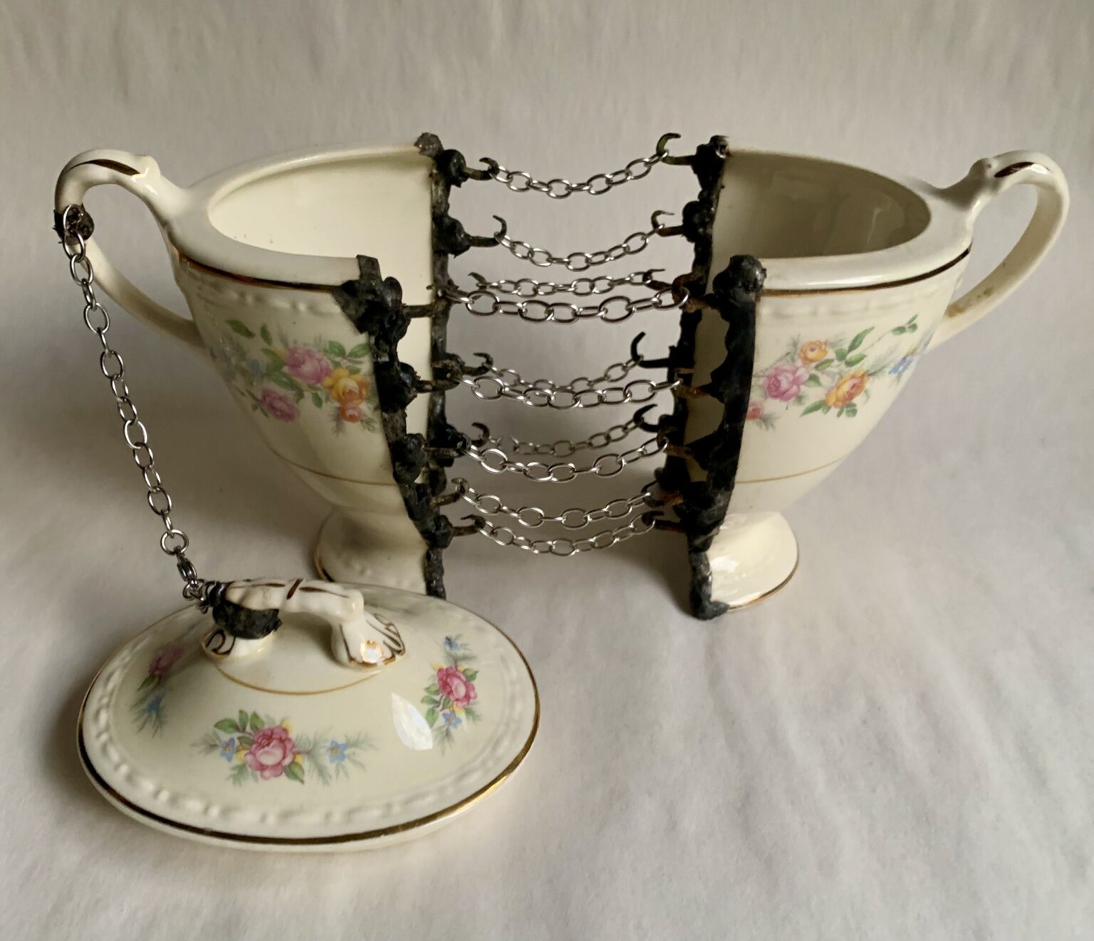 This Artist Mends Shattered Vessels By Using Rusted Wires and Scissors ...