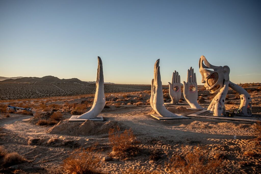 Artist Designs Unique Sculptures Of Women And Hands In The Mojave ...