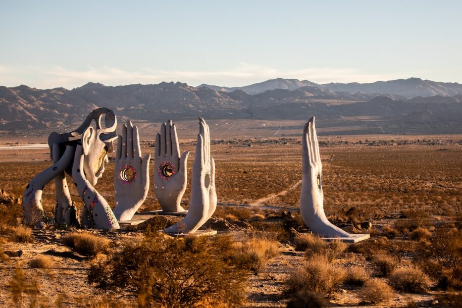 Artist Designs Unique Sculptures Of Women And Hands In The Mojave ...