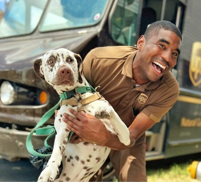 40 Viral Pics Of UPS Employee Posing With Every Dog He Meets While ...