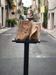 Faces And Hands Merge With Manuscripts In These Captivating Sculptures ...