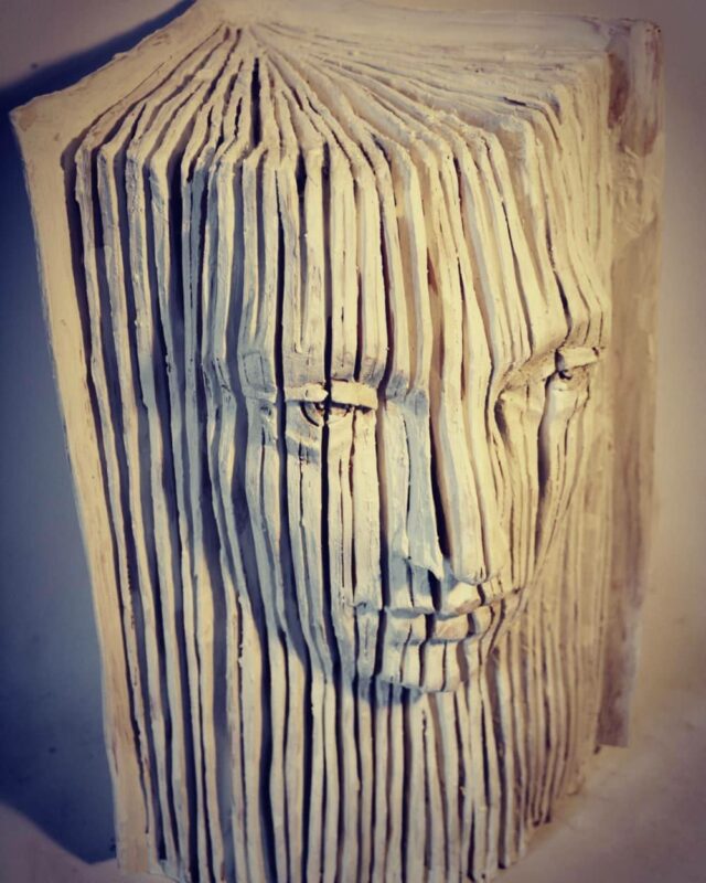 Faces And Hands Merge With Manuscripts In These Captivating Sculptures ...