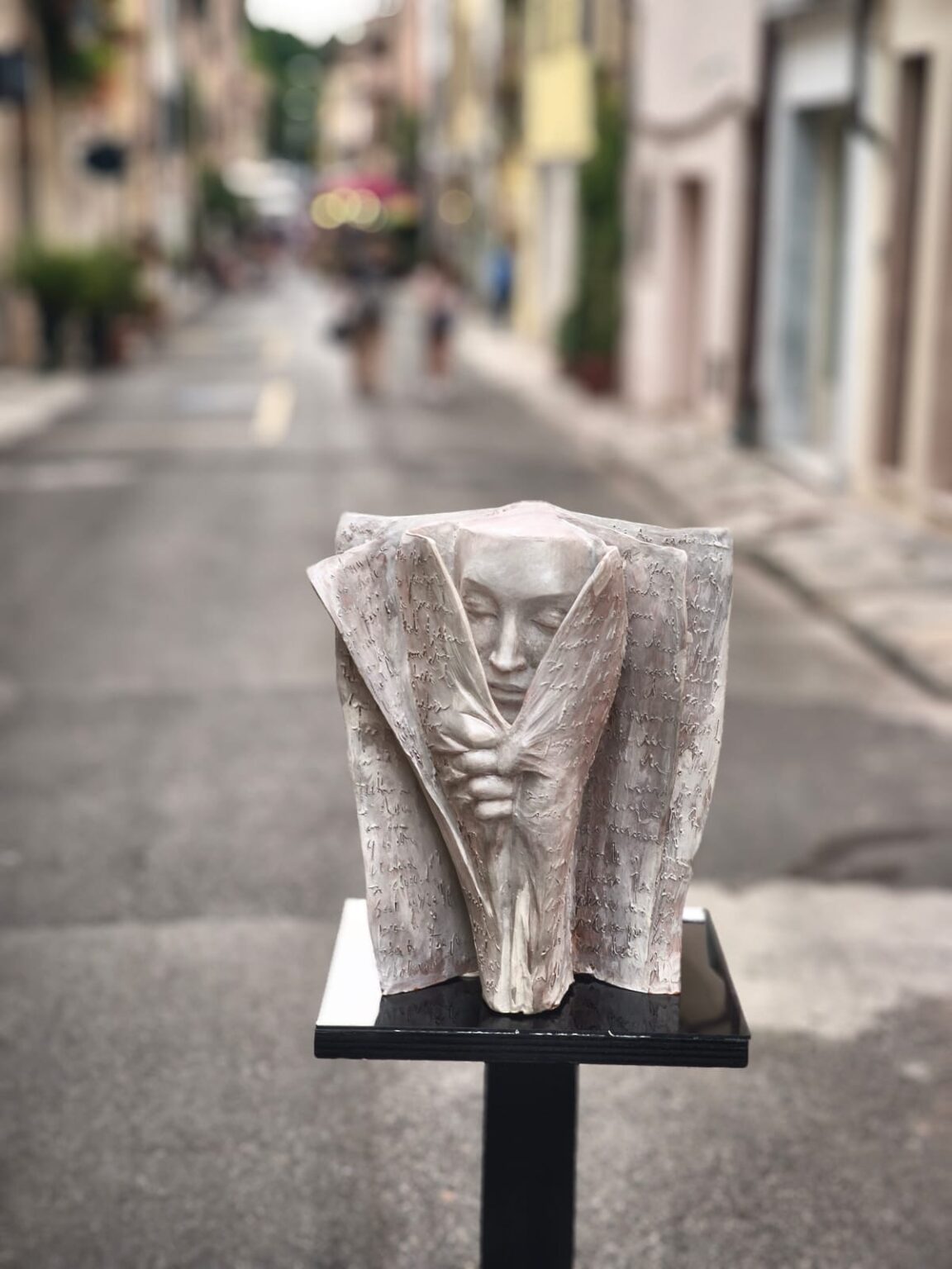 Faces And Hands Merge With Manuscripts In These Captivating Sculptures ...