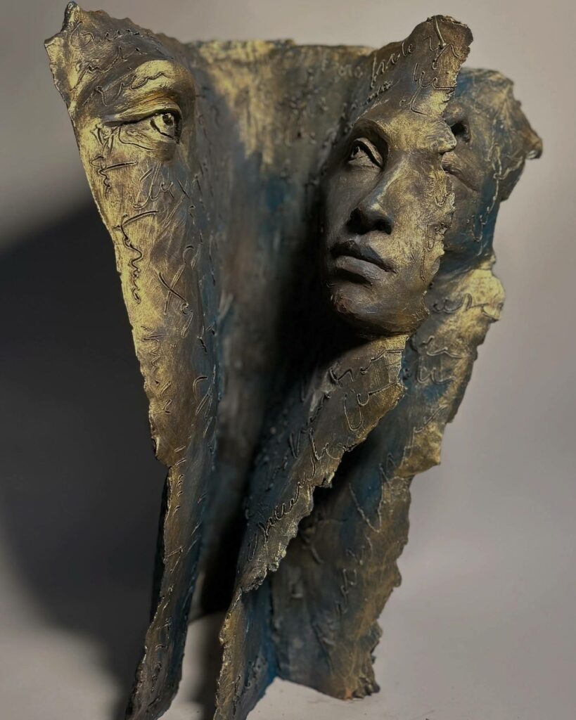 Faces And Hands Merge With Manuscripts In These Captivating Sculptures ...