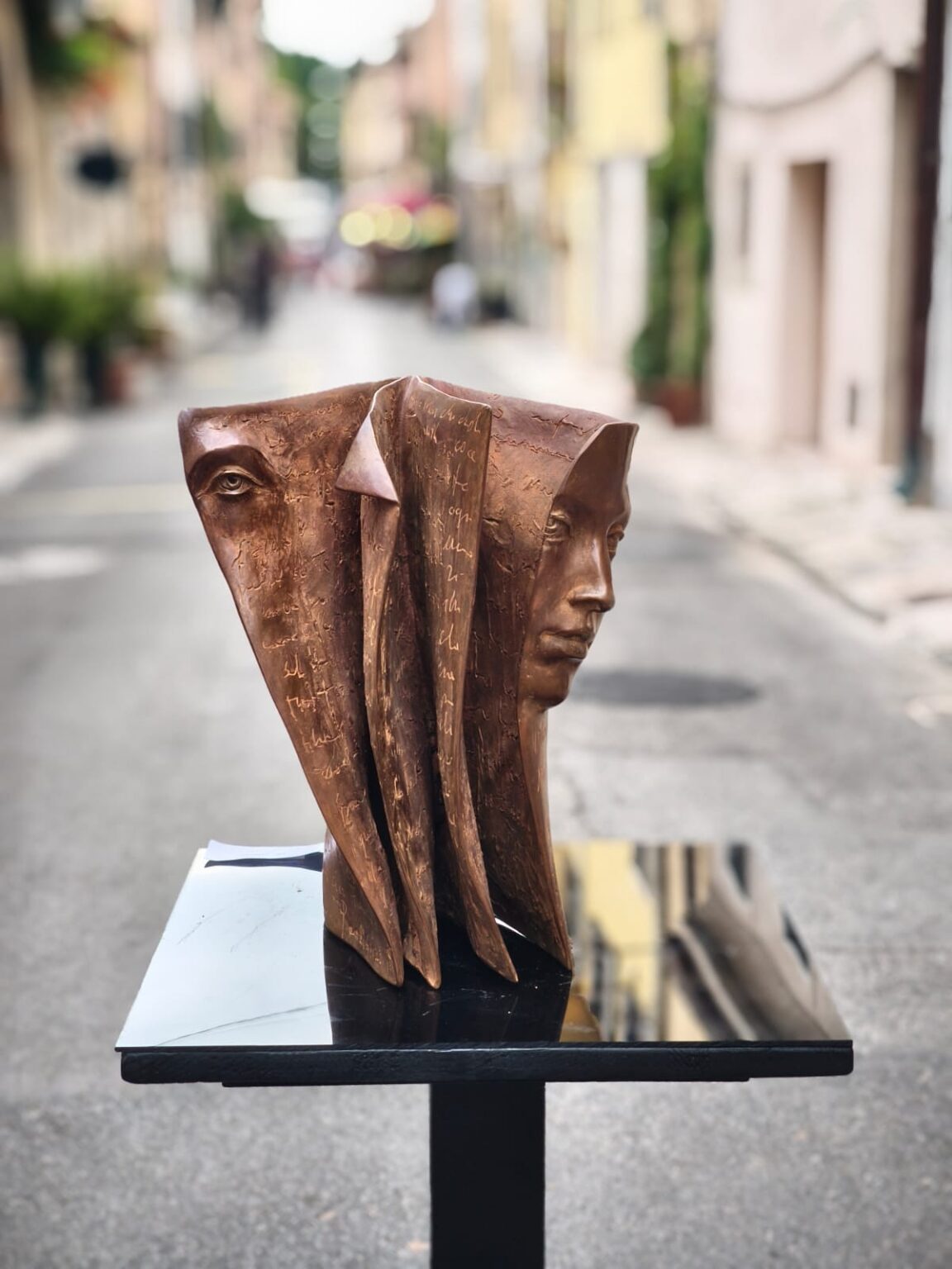 Faces And Hands Merge With Manuscripts In These Captivating Sculptures ...
